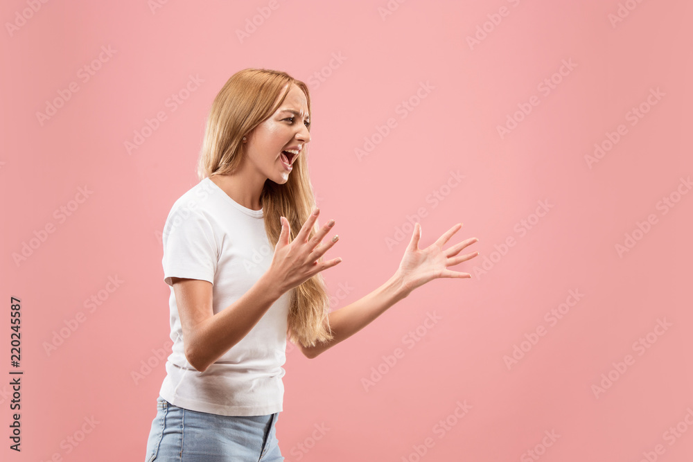 Screaming, hate, rage. Crying emotional angry woman screaming on studio ...