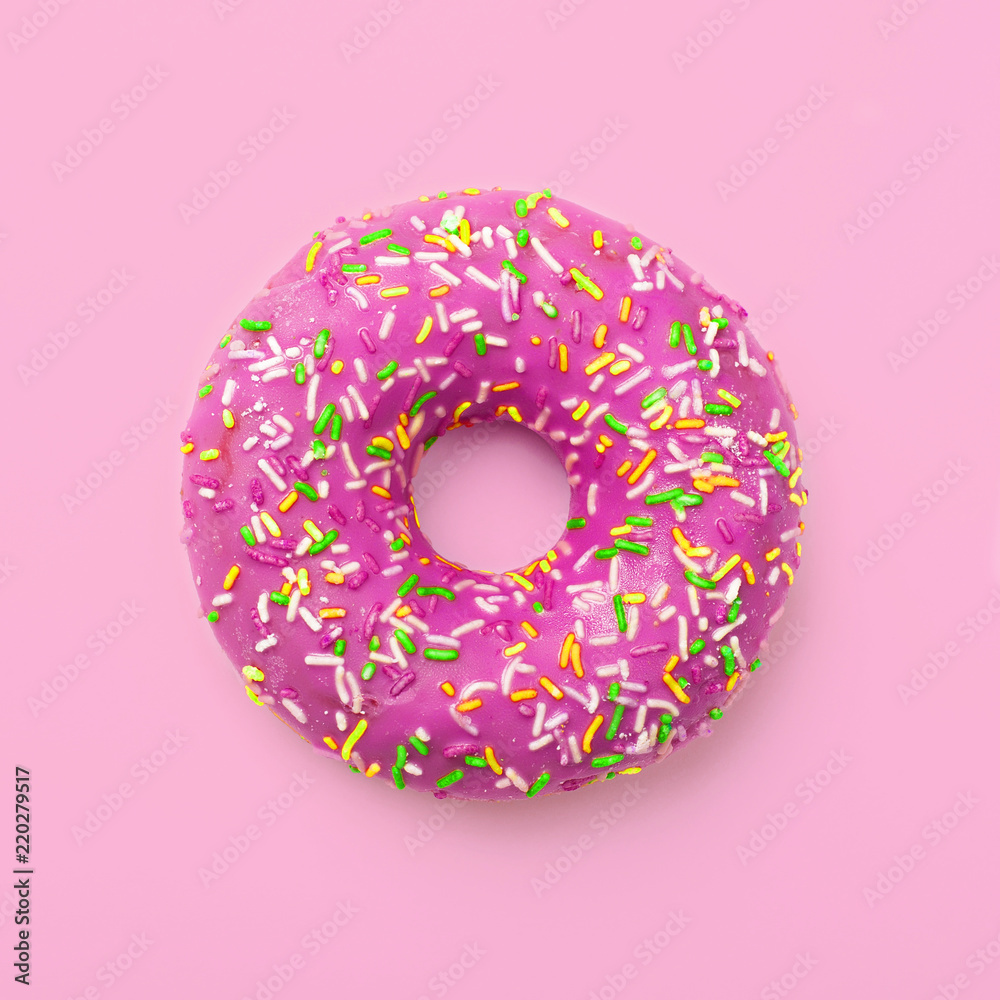 Purple donut in glaze on a pink background. Great fresh tasty purple ...