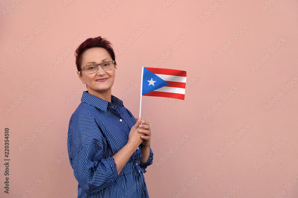 Puerto Rico flag. Woman holding Puerto Rico flag. Nice portrait of ...