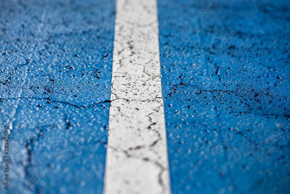 Abstract, blue background of newly made outdoor basketball court in ...