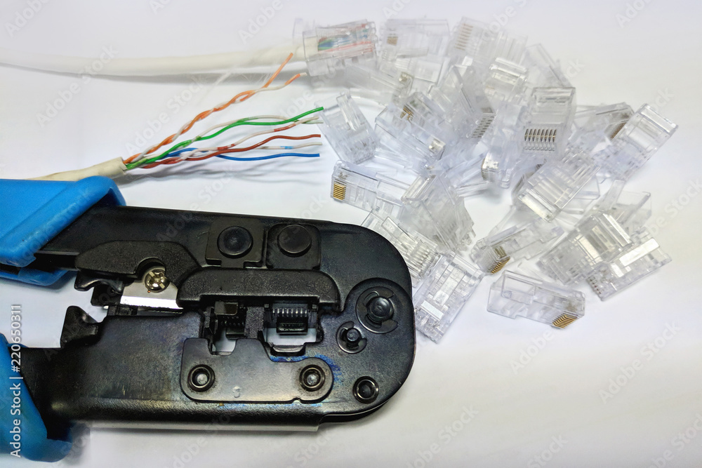Photo Stock Crimper, connectors ,rj45 and ethernet cable for build and ...