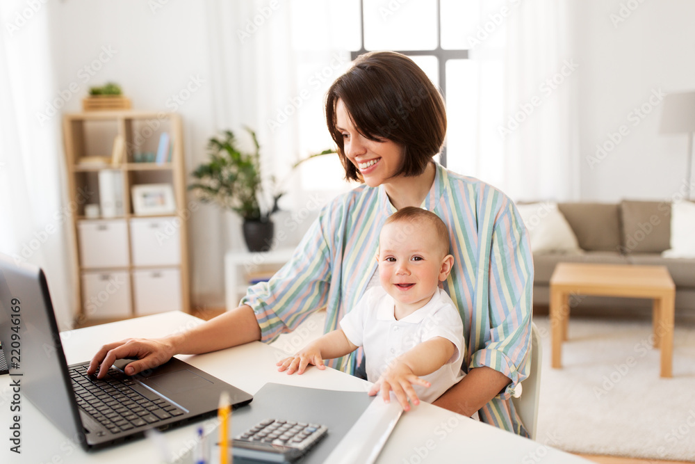 multi-tasking, freelance and motherhood concept - working mother baby boy and laptop computer at ...