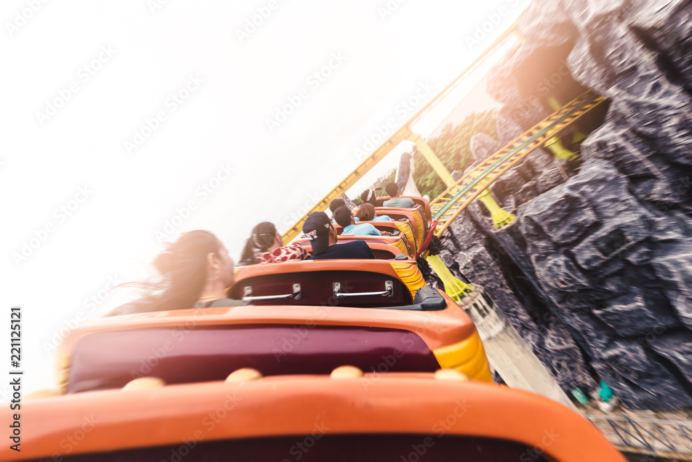 the abstract image of the roller coaster running on the rail in ...