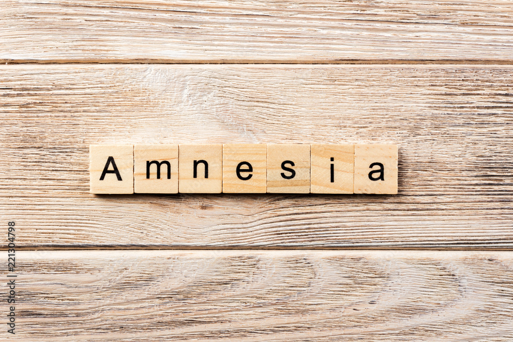 amnesia word written on wood block. amnesia text on table, concept ...