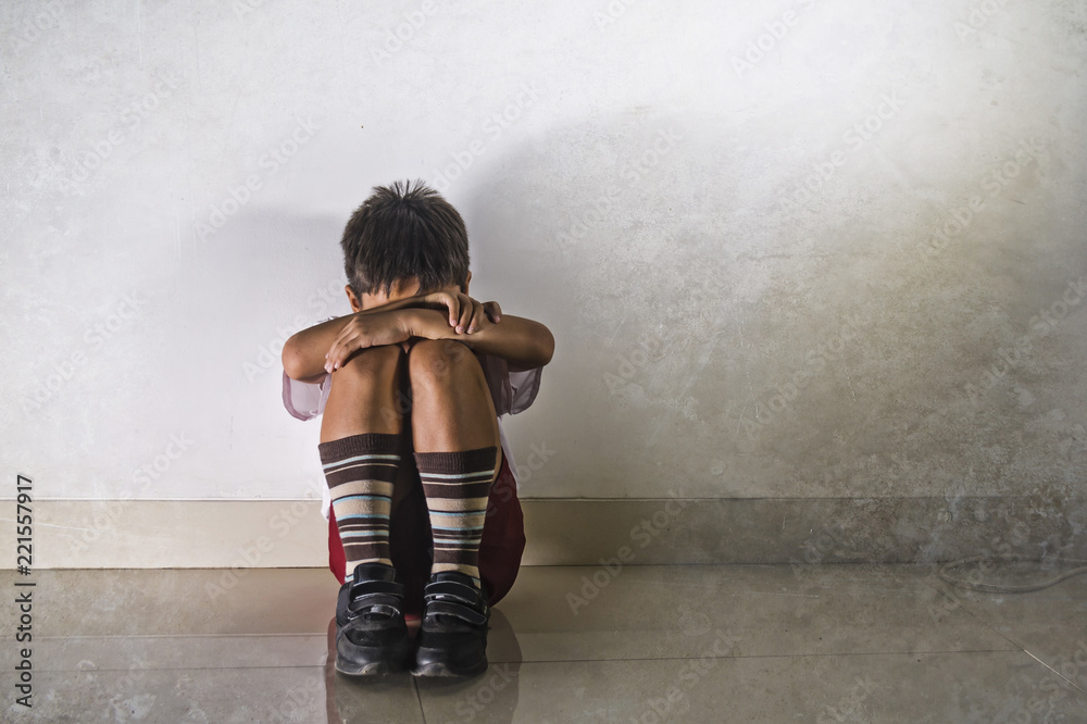 bullying victim portrait of young sad and scared kid in school uniform ...