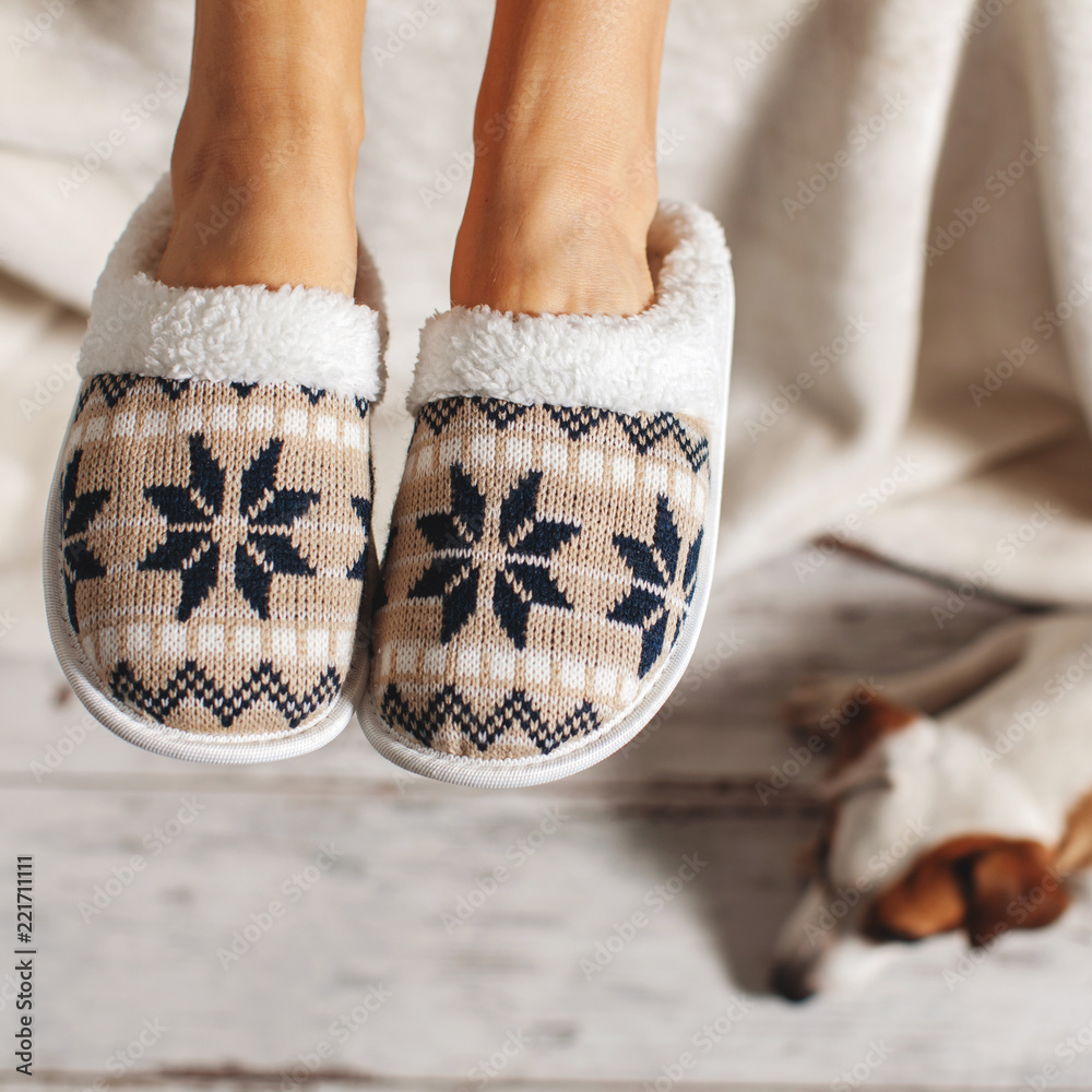 Female legs in slippers Stock Photo | Adobe Stock