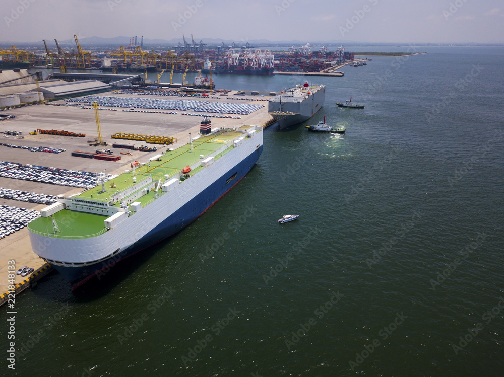 Aerial view of logistics concept floating dry dock servicing cargo ship ...