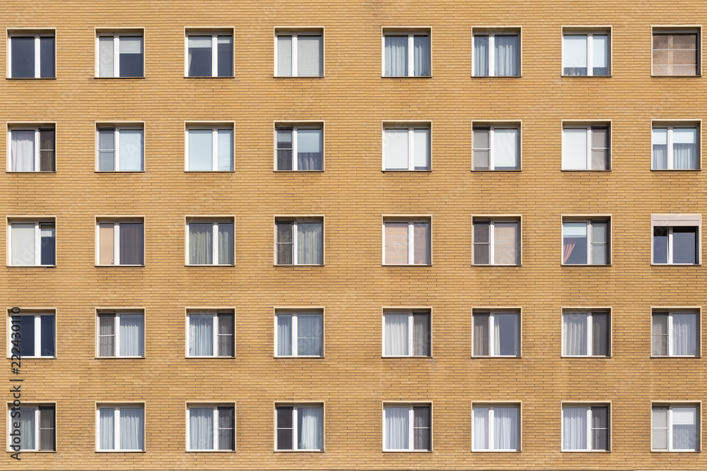 Fragment of multi-storey building with windows, texture, background ...