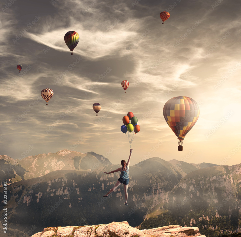 Flying with big balloons Stock Photo | Adobe Stock