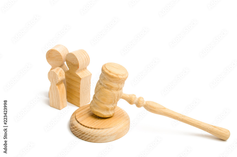 Judge's hammer and family. Court cases on family disputes. Adoption of ...