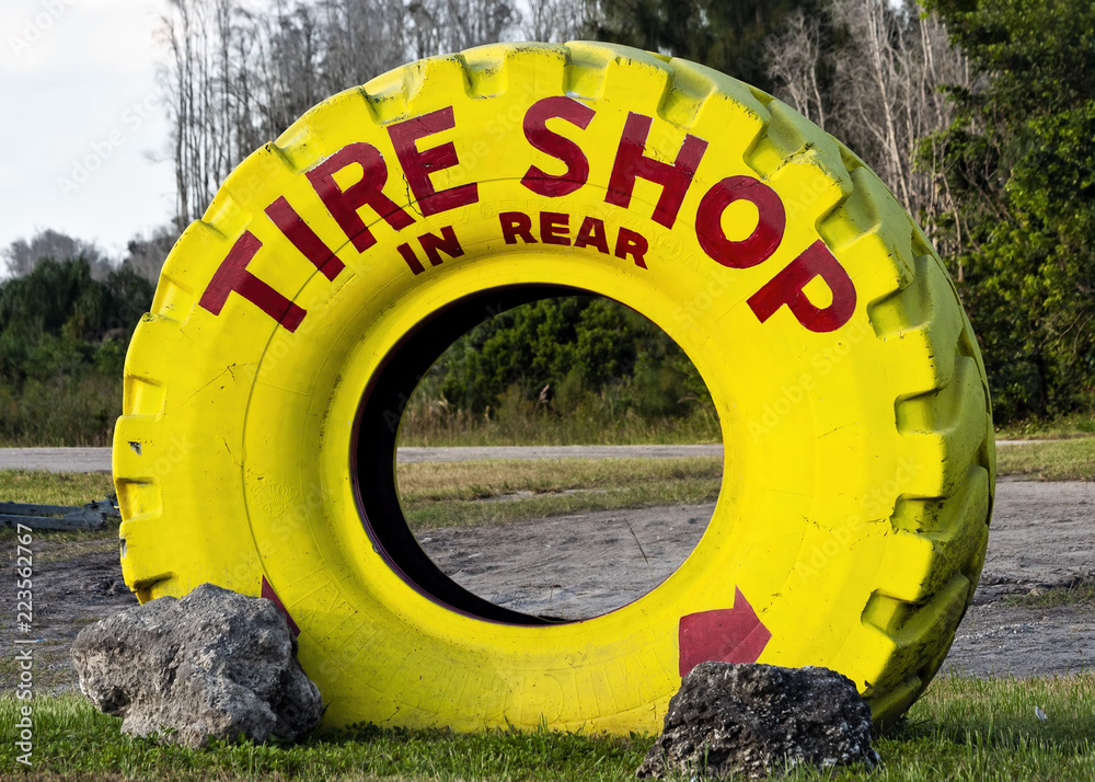 Tire Shop Truck Tire Sign Stock Photo | Adobe Stock