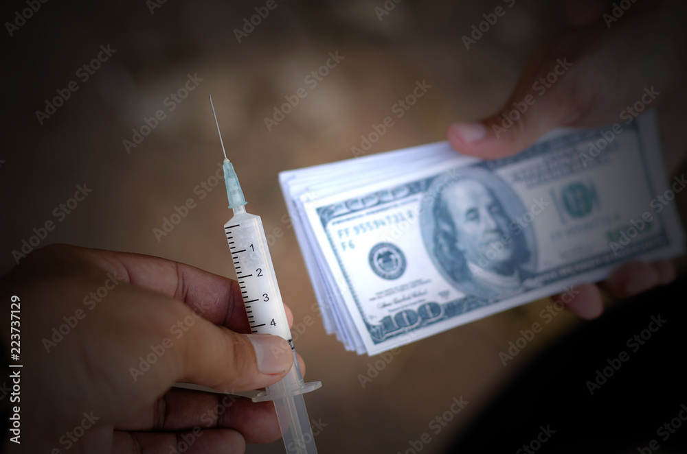 Foto de Stock Concept: the Asian men are buying-selling drugs with ...