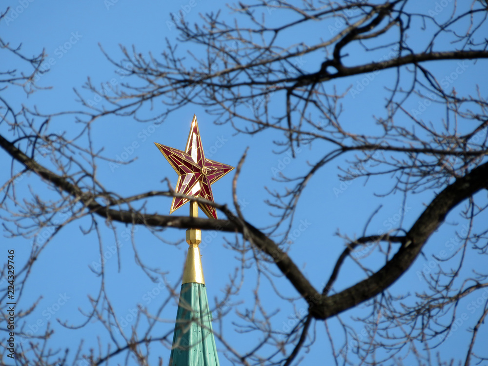 Russian red star on the tower of the Moscow Kremlin. View through the ...