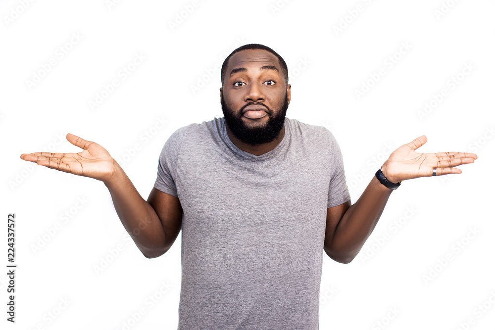 Uncertain hesitant black man shrug shoulders in bewilderment, can`t ...