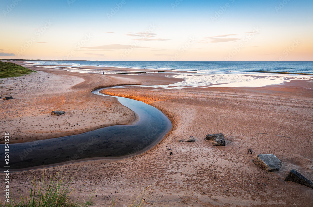 Dunbar Burn winding over Druridge Beach / Druridge Bay is a seven mile ...
