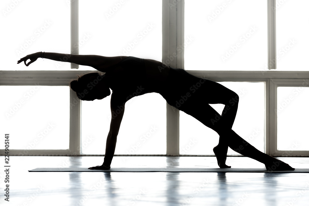 Stock-Foto „Young sporty attractive woman practicing yoga, doing Wild ...