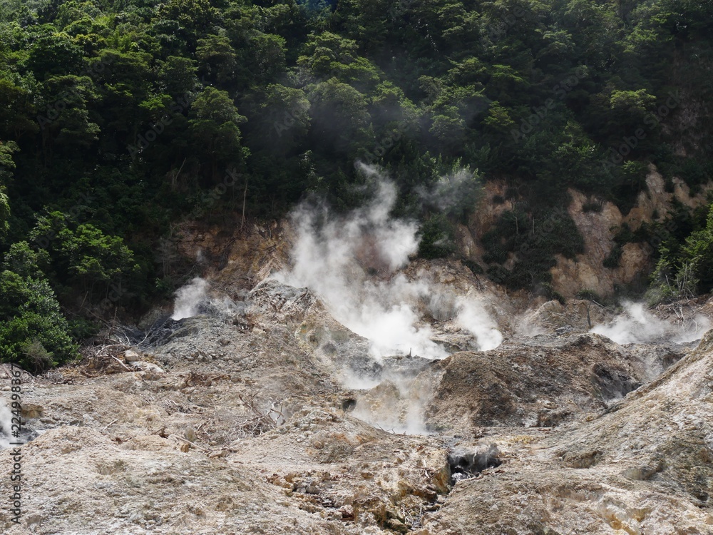 Wide shot of the smoke rising up from the craters at the drive-thru ...