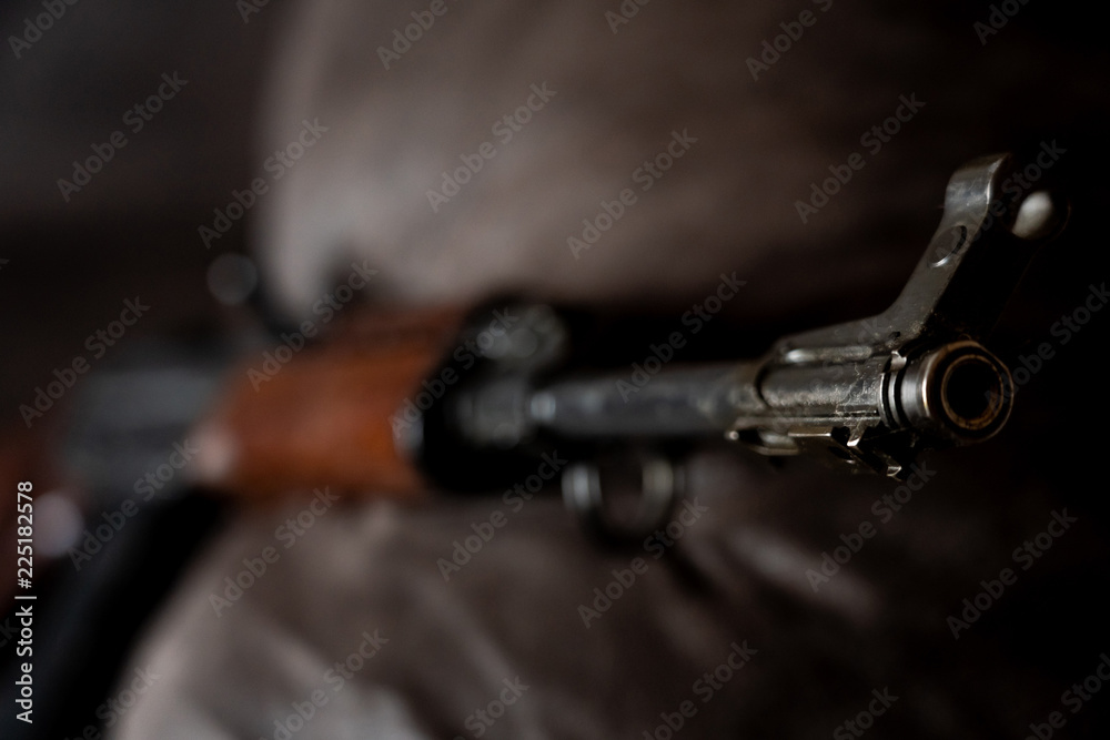 Low key photo of AK-47 Kalashnikov rifle. Dark themed automatic rifle ...