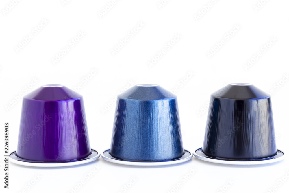 Italian coffee espresso capsules or coffee pods on isolated white ...