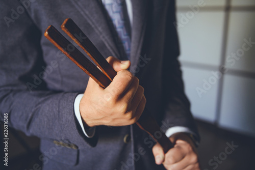 Man with leather tawse. Strict headmaster with tawse. Corporal ...