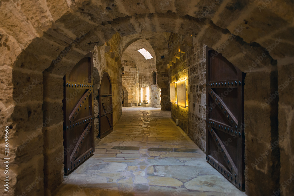 Medieval castle fortress interior wall dungeon dark canon balls gate ...