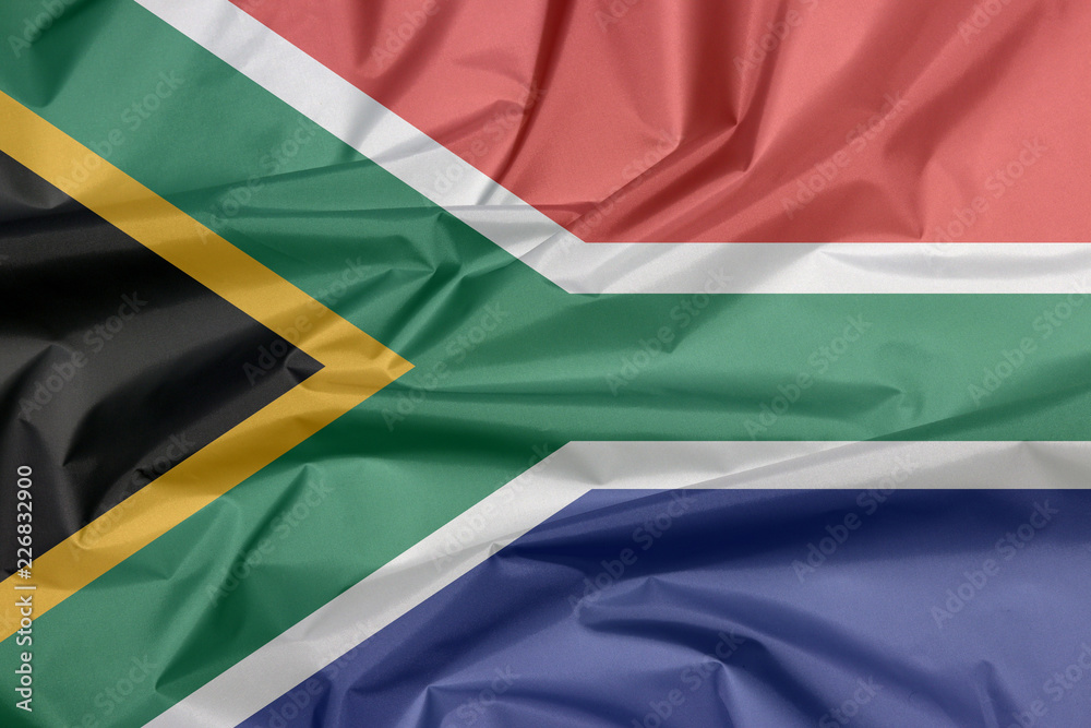 Fabric flag of South Africa. Crease of South African flag background ...