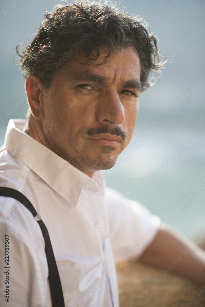 Portrait of a man with an interesting face typical of southern Italy ...