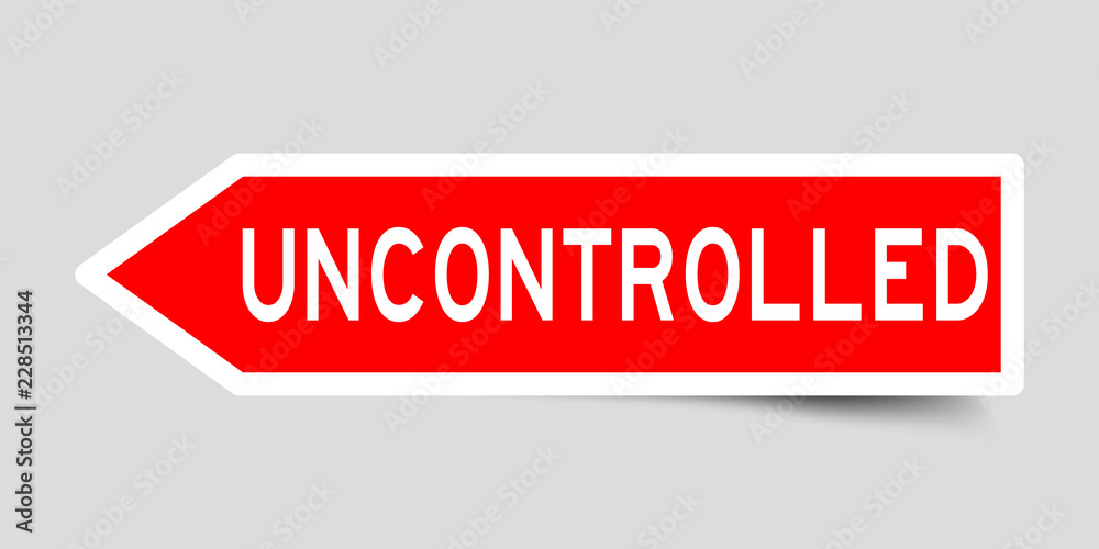 Label sticker in red color arrow shape as word uncontrolled on white ...