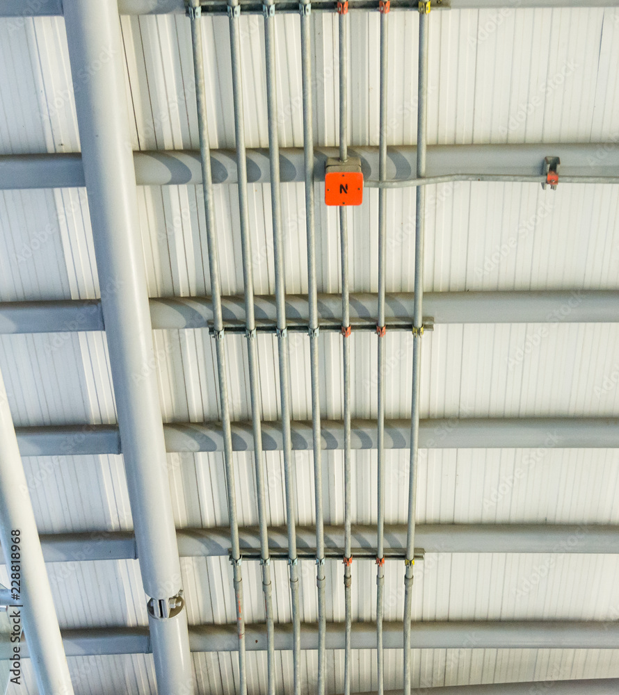 power line in running conduit tube on ceiling, galvanized steel conduit ...
