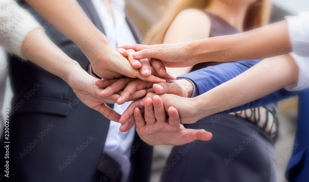 Business teamwork concept. Business persons is joining their hands to ...