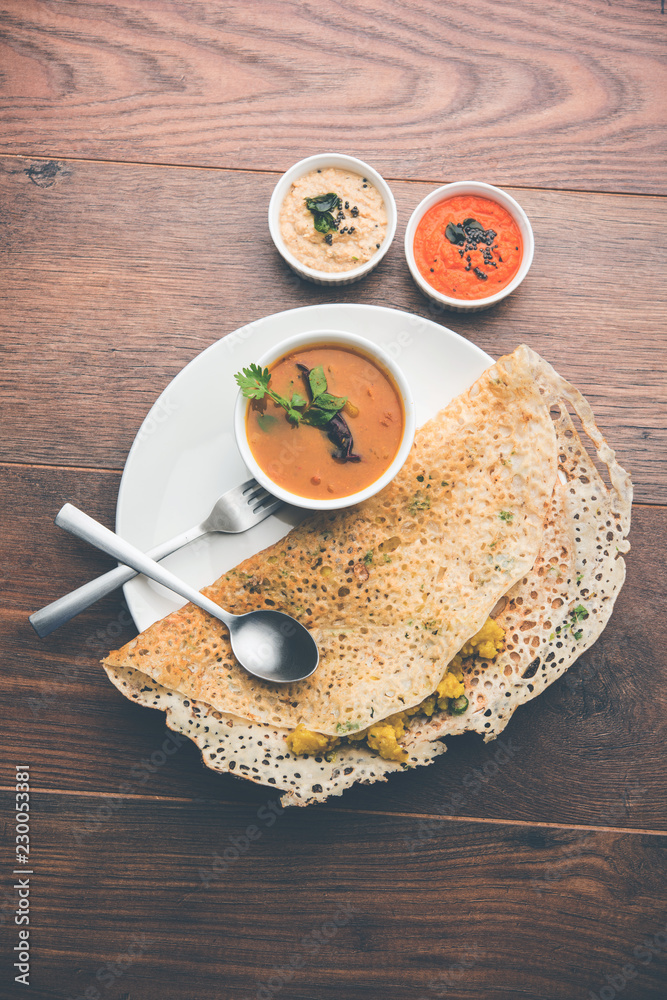 Onion rava masala dosa is a South Indian instant breakfast served with ...