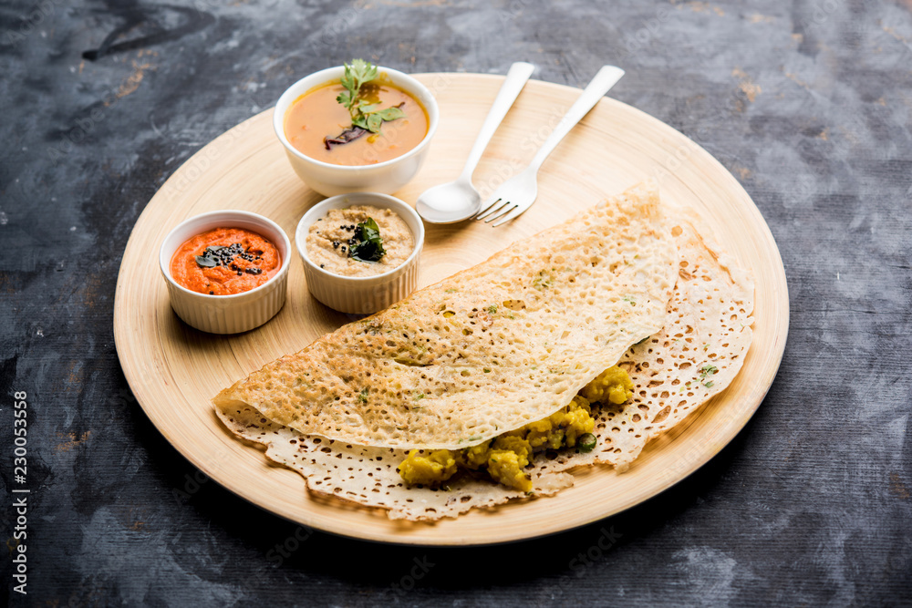 Onion rava masala dosa is a South Indian instant breakfast served with ...