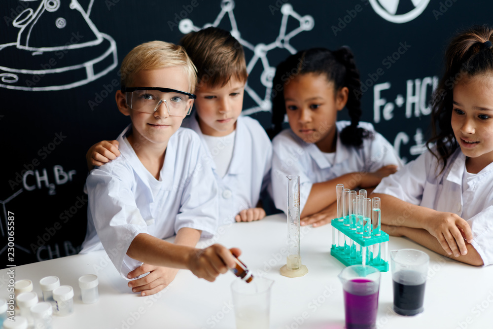 Multiracial group of diverse smart little scientists, mixed race girls ...