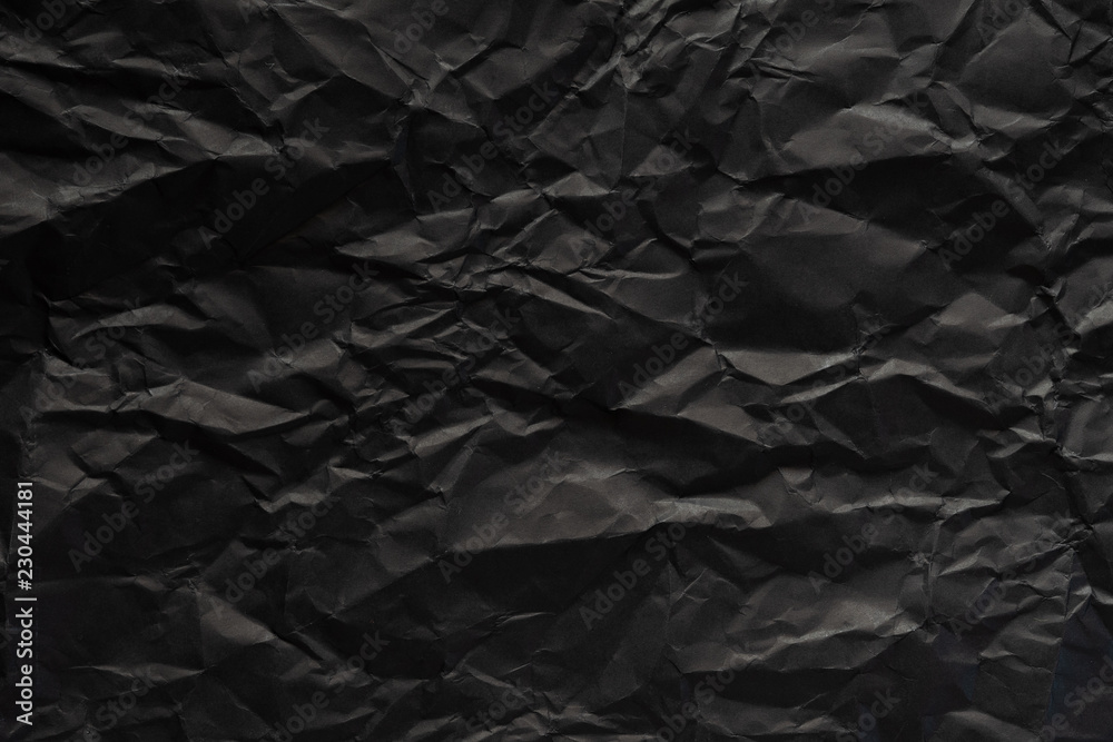 Black crumpled paper texture background. Stock Photo | Adobe Stock