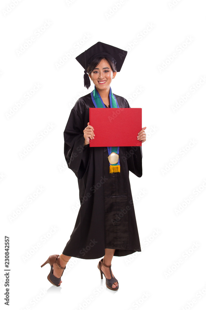 Happy graduating female student with a red placard, full body portrait ...