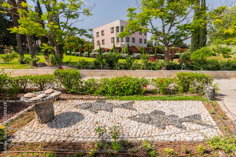 Stone sculpture composition two fish and five loaves of bread in ...
