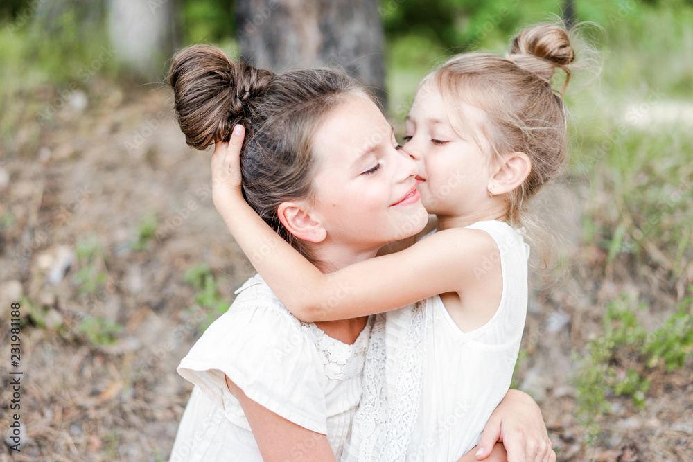 Portrait of two girls in the woods girlfriends Stock Photo | Adobe Stock
