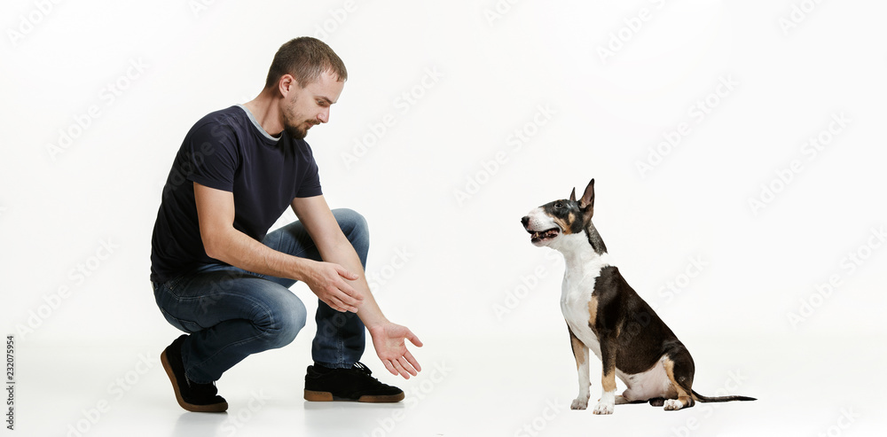 Emotional Portrait of surprised man and his dog, concept of friendship ...