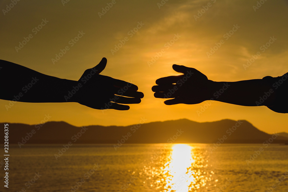Silhouette of helping hand concept and international day of peace, Expression of Business ...