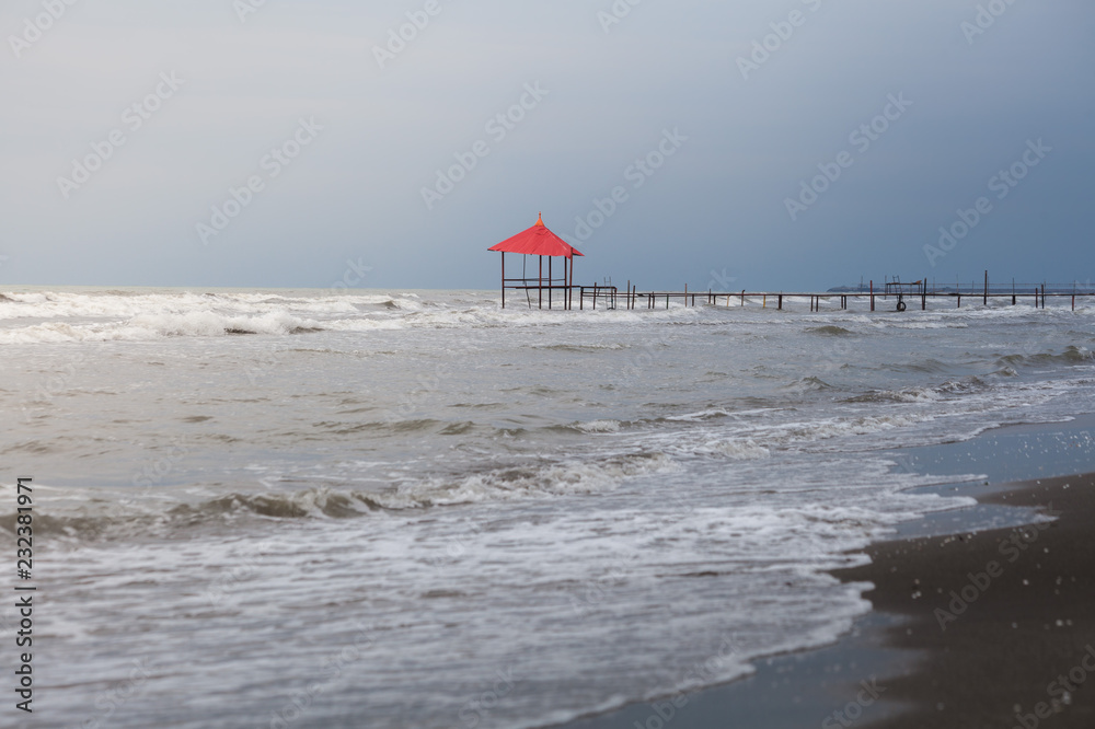 Gisoom Beach, Talesh, Iran. .Fishermen see footbridge or jetty at the ...