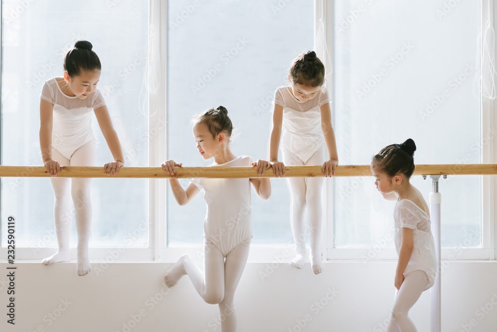 Girls relaxing in ballet studio Stock Photo | Adobe Stock