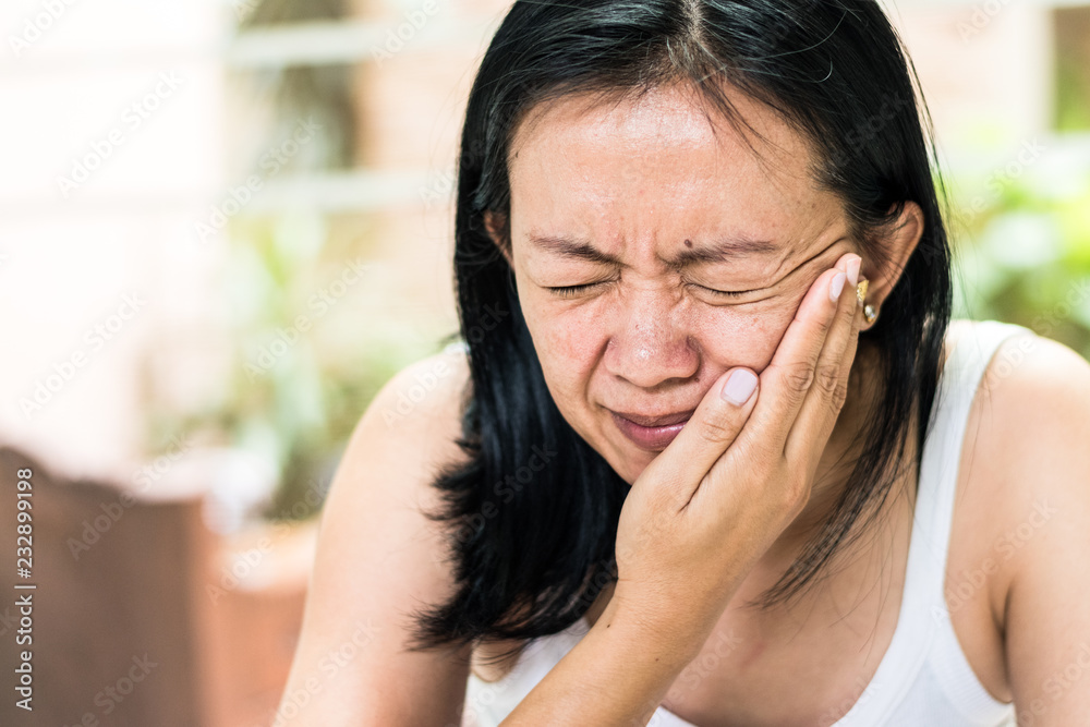 Temporomandibular Joint and Muscle Disorder: TMD concept. Woman hand on ...