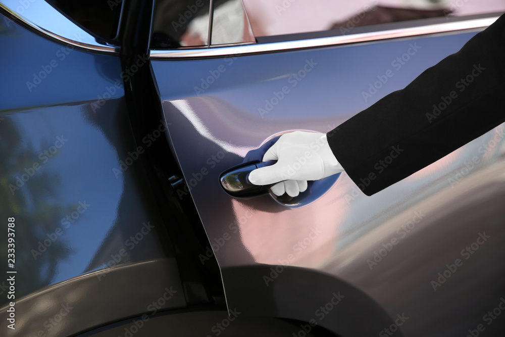 Driver opening car door, closeup. Chauffeur service Stock Photo | Adobe ...