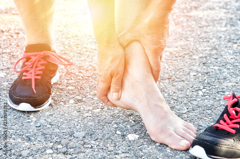 Pain in the foot.Running injury leg accident- sport woman runner ...