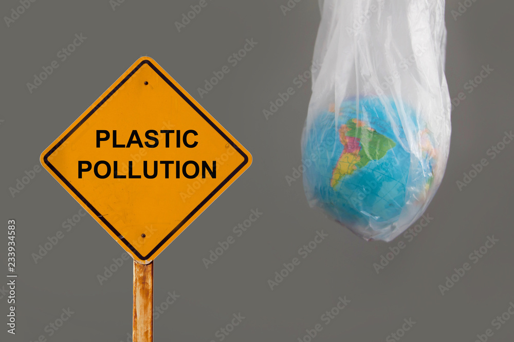 Stock-Foto „globe in plastic bag with warning sign message PLASTIC ...