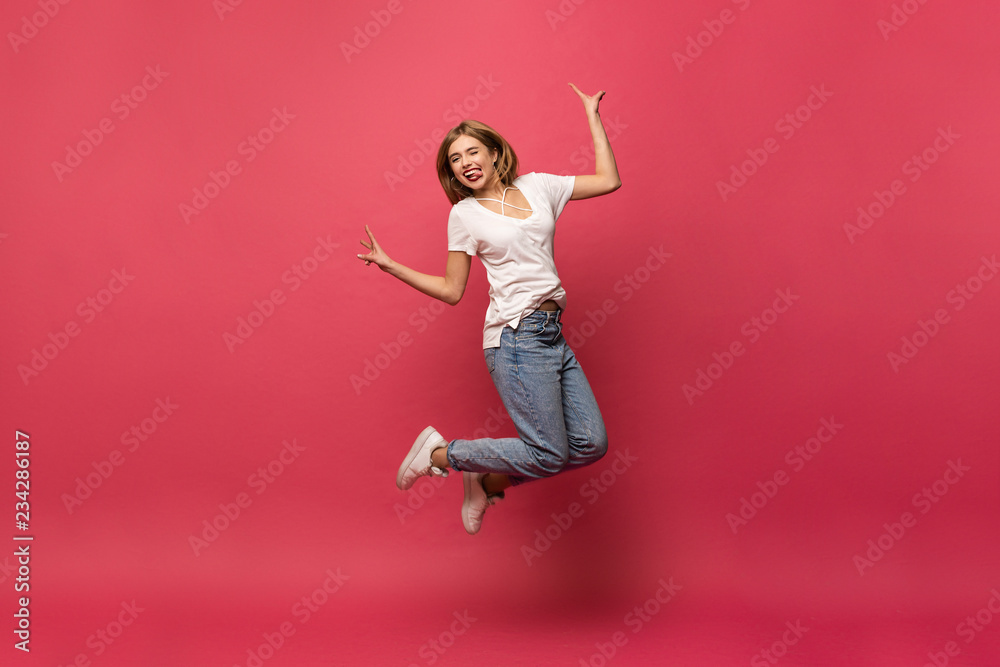 happiness, freedom, motion and people concept - smiling young woman ...