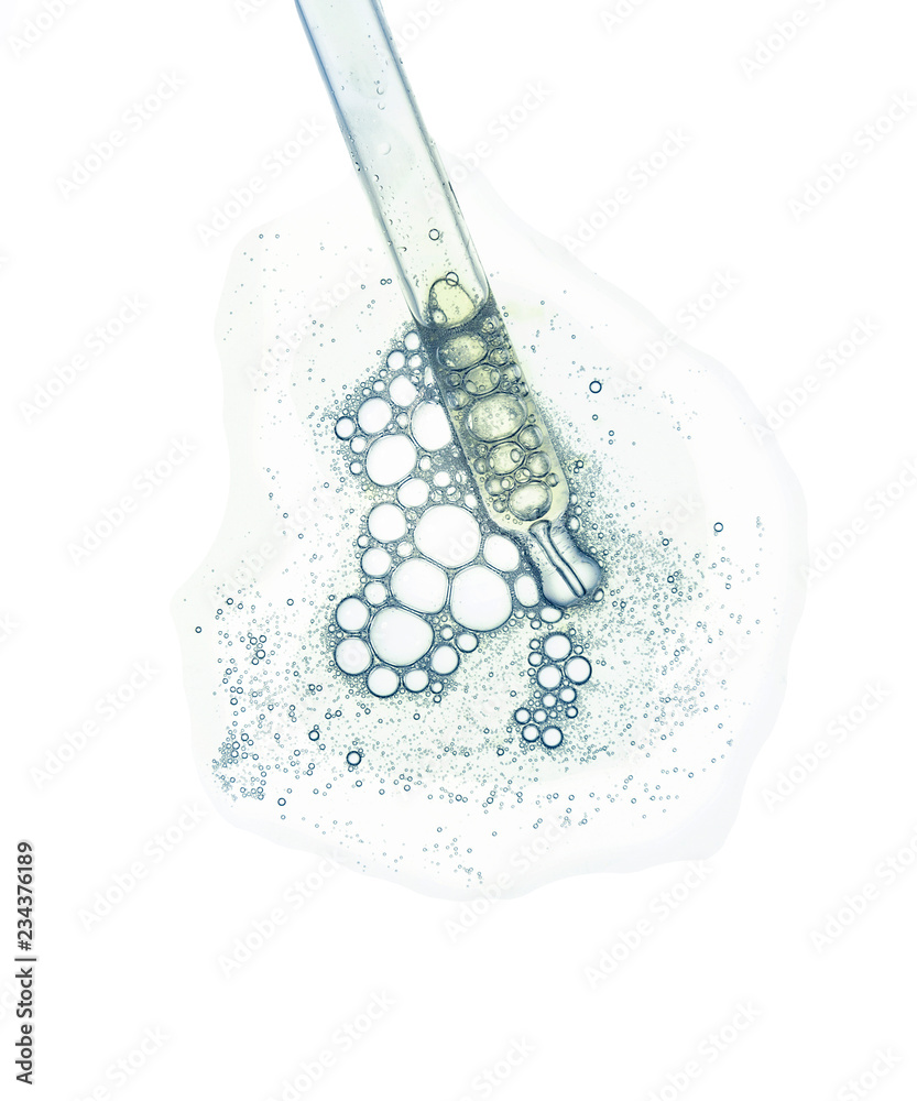 Liquid gel or serum on a screen of microscope white isolated background ...