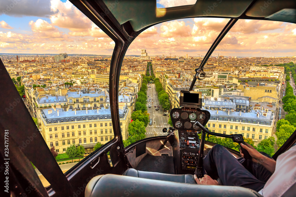 Helicopter cockpit flying on Paris skyline of the French capital ...
