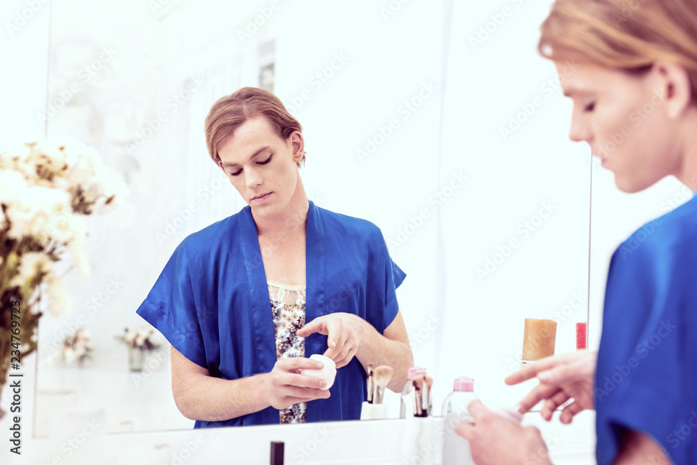 Transgender woman washing hands Stock Photo | Adobe Stock