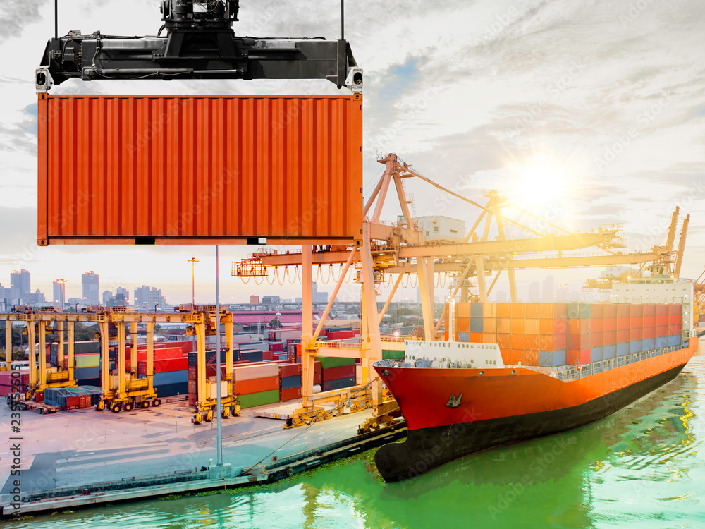 Crane lifting up container ship cargo containers loading to harbor in ...